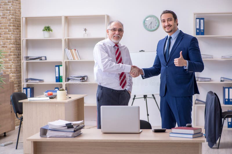 Two Employees in the Office Stock Photo - Image of employer ...