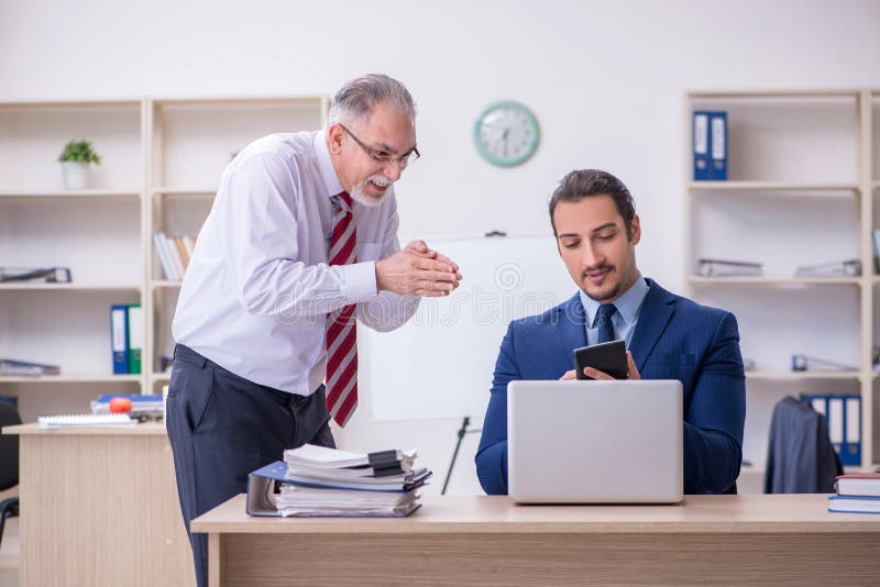 Two Employees in the Office Stock Photo - Image of businessmen ...