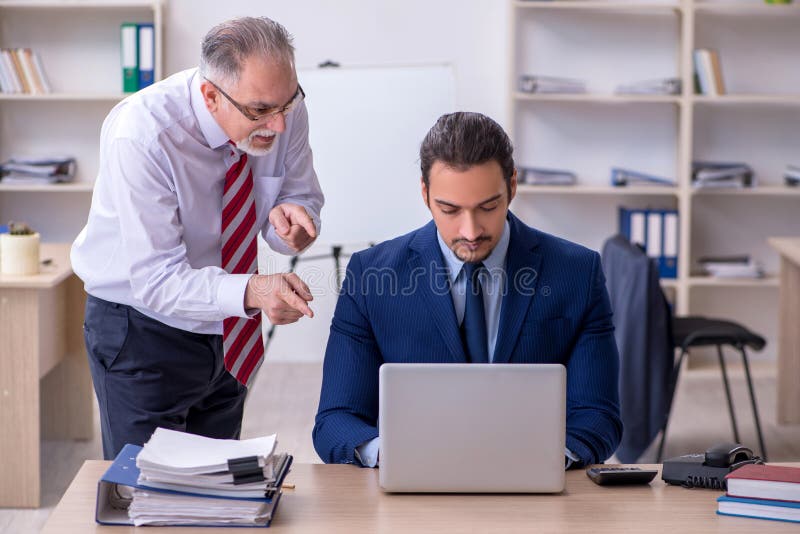 Two Employees in the Office Stock Photo - Image of explaining ...