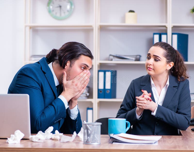 Two Employees Suffering at Workplace Stock Image - Image of cold ...
