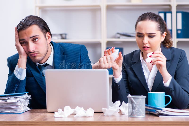 Two Employees Suffering at Workplace Stock Photo - Image of allergy ...