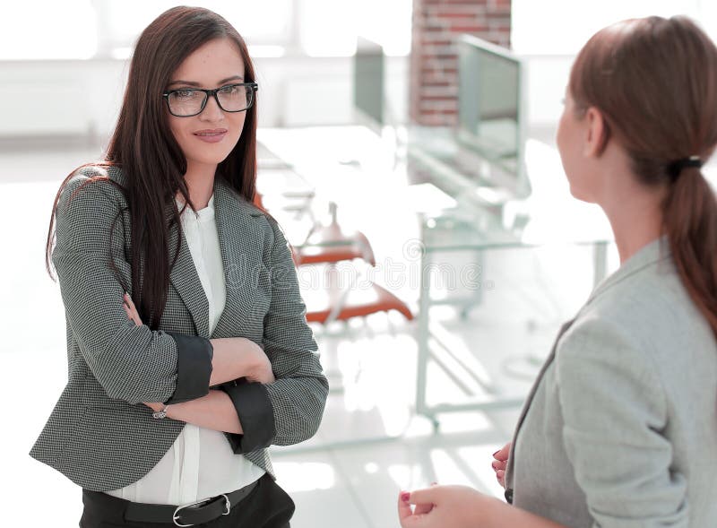 Two Employees Talking Standing in the Office Stock Photo - Image of ...