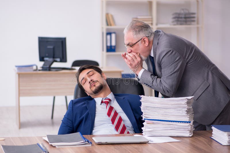Two Male Employees and Too Much Work in the Office Stock Photo - Image ...