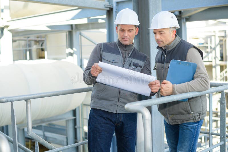 131 Employees Talking Factory Stock Photos - Free & Royalty-Free Stock ...