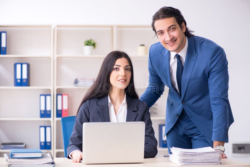 The Two Employees Working in the Office Stock Image - Image of laptop ...