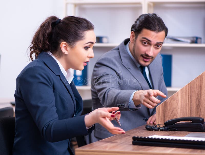 Two Employees Working in the Office Stock Image - Image of arguing ...