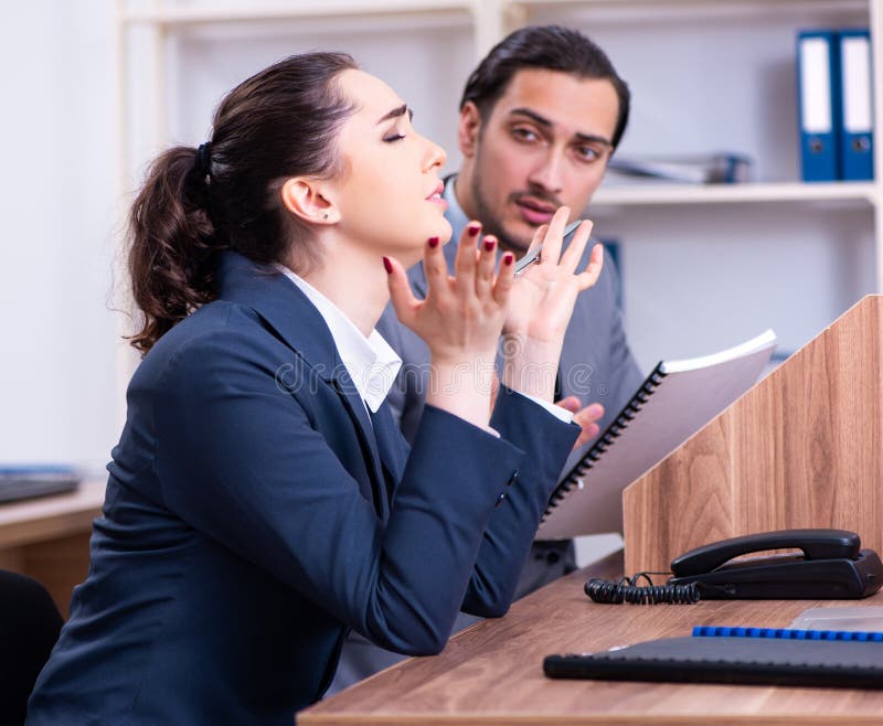 Two Employees Working in the Office Stock Photo - Image of frustrated ...