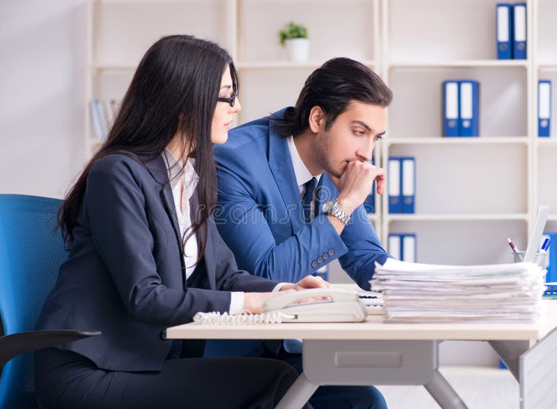 Two Employees Working in the Office Stock Photo - Image of focused ... Two Employees Working in the Office Stock Photo - Image of focused ...