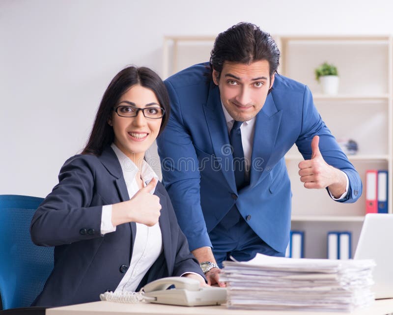 Two Employees Working in the Office Stock Image - Image of discussing ...