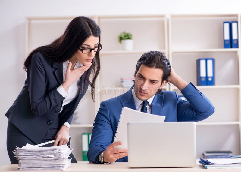 Two Employees Working in the Office Stock Photo - Image of company ...