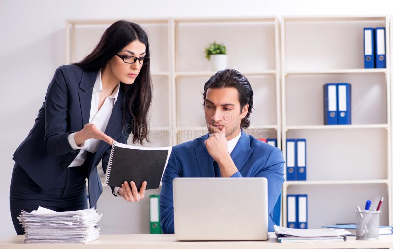 Two Employees Working in the Office Stock Photo - Image of business ...