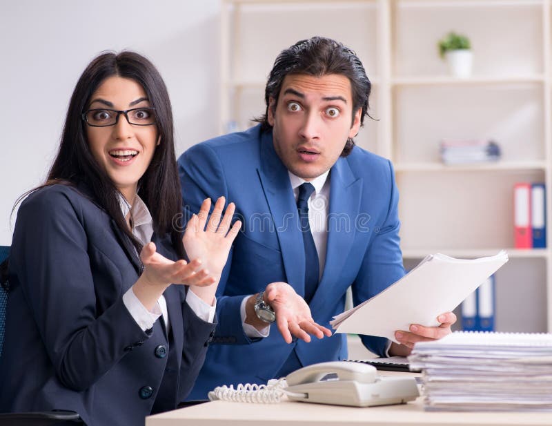 Two Employees Working in the Office Stock Image - Image of ...