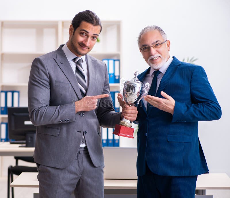 Two Male Employees Working in the Office Stock Image - Image of month ...