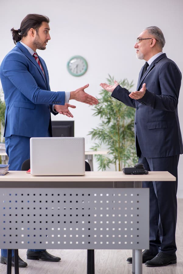 Two Employees at Workplace during Pandemic Stock Photo - Image of hand ...