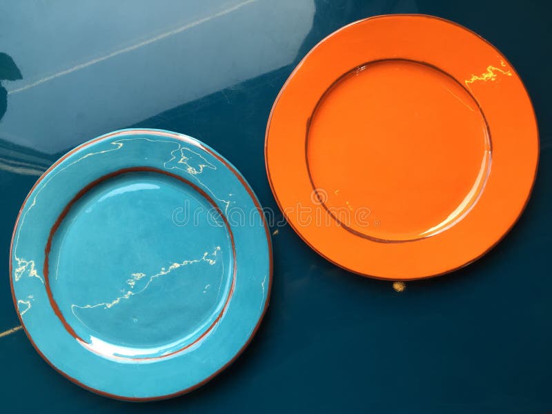 Two Empty Ceramic Plates Stand on the Table. Stock Image - Image of ...