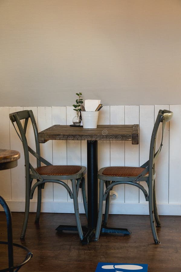 Two Empty Chairs at a Rustic Cafe Table with No People Stock Image ...