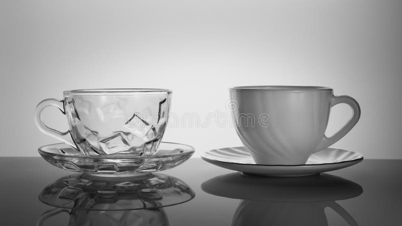 Two Empty Cups on the Table with a Reflection Stock Image - Image of ...