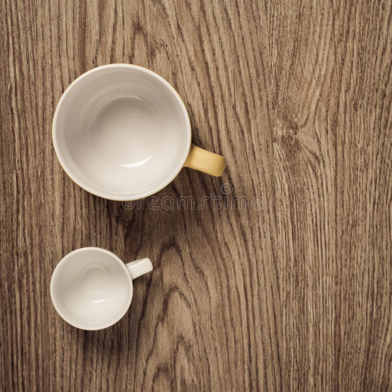 Two Empty Cups on Wooden Floor Stock Photo - Image of wooden, timber ...
