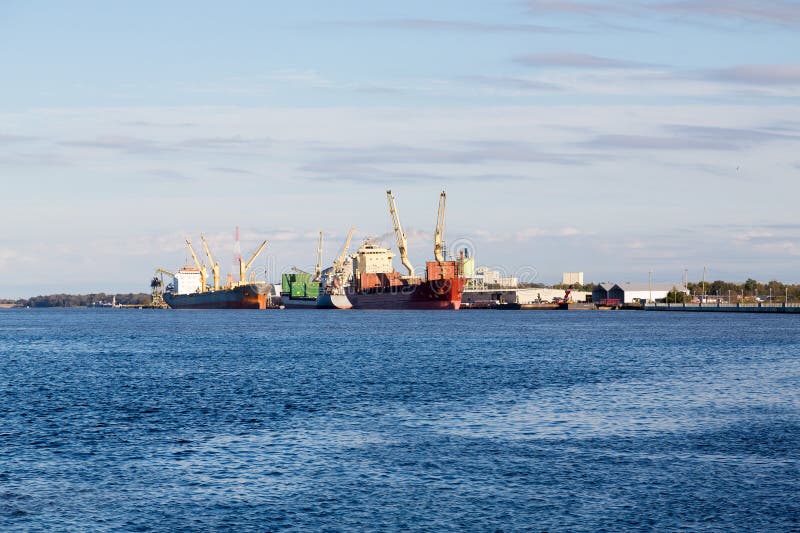 Two Empty Freighters at Dock Stock Photo - Image of shipping, pier ...