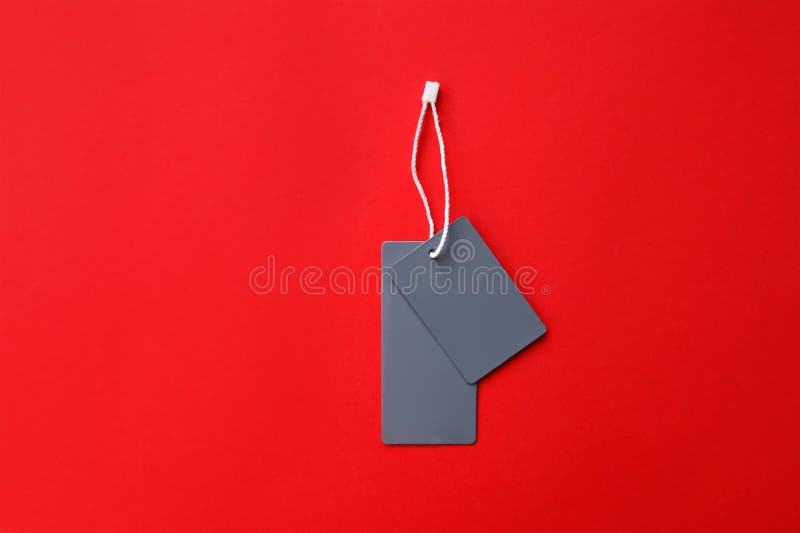 Two Empty Gray Tags on a Red Background. Copy Stock Photo - Image of ...