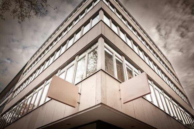 Two Empty Rectangular White Signs Protrude from the Corner of a German ...
