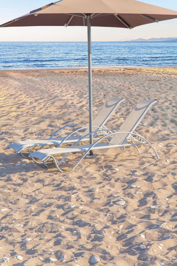 Two Empty Sun Bed at Big Sandy Beautiful Beach with Blue Sea Stock ...