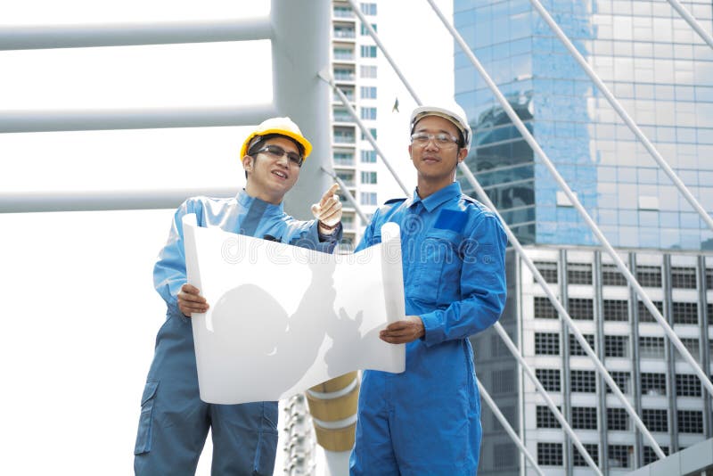 Two Engineer or Architect Discuss on Modern Building Project at Stock ...