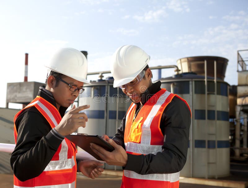 Site Manager and Construction Worker Checking Plans Stock Photo - Image ...
