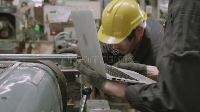 Two Engineer Man Training Work with Laptop Computer Together in Factory ...