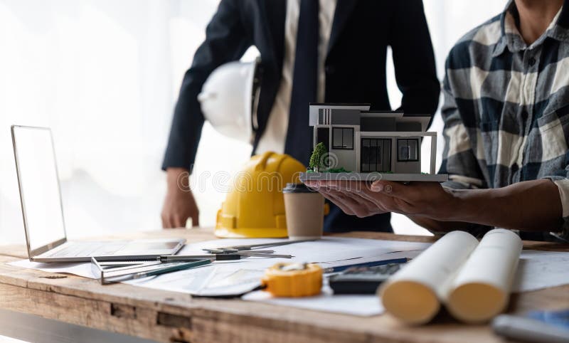 Two Engineer Man Working with Laptop and Inspection for Architectural ...