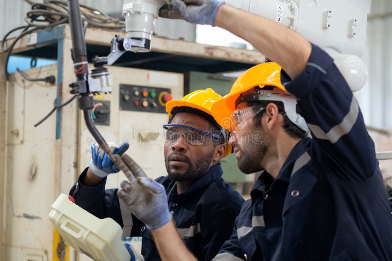 Two Engineer Man Working with Machine Robot Automatic Together at ...