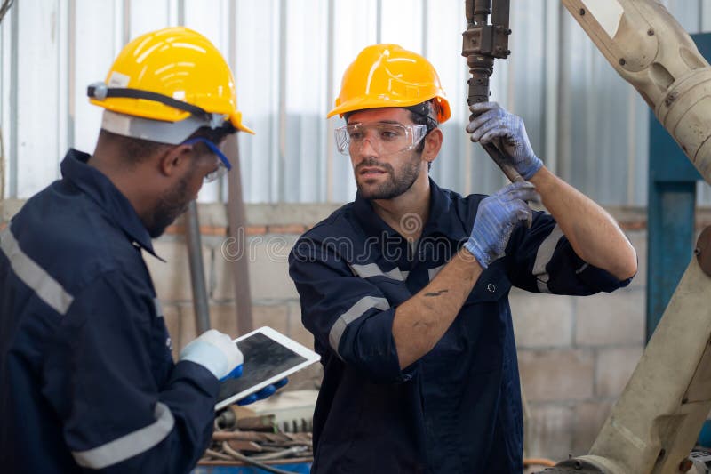 Two Engineer Man Working with Machine Robot Automatic Together at ...