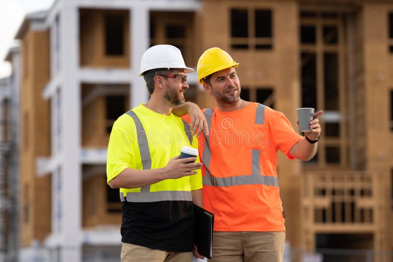 Two Engineer Men at Construction Site Wearing Hardhat Outdoor Stock ...