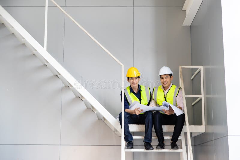 Two engineer reading plan stock image. Image of equipment - 177546427