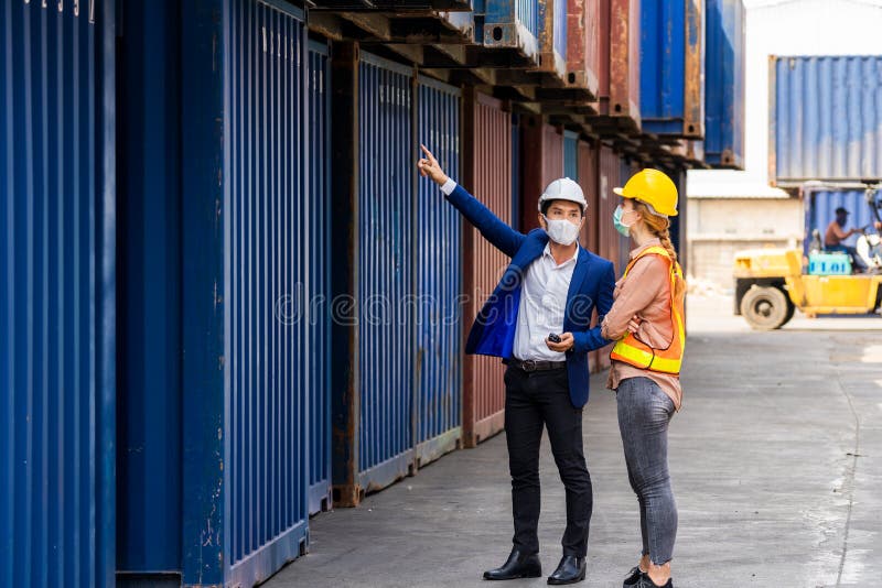 Two Engineer Worker Hold a Laptop, Document for Checking a Quality of ...