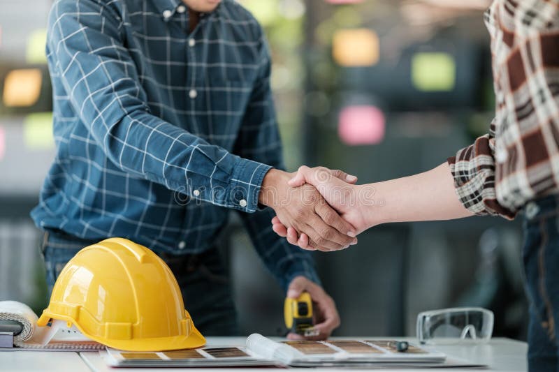 Two Engineering Man with Construction Worker Greeting a Foreman at ...