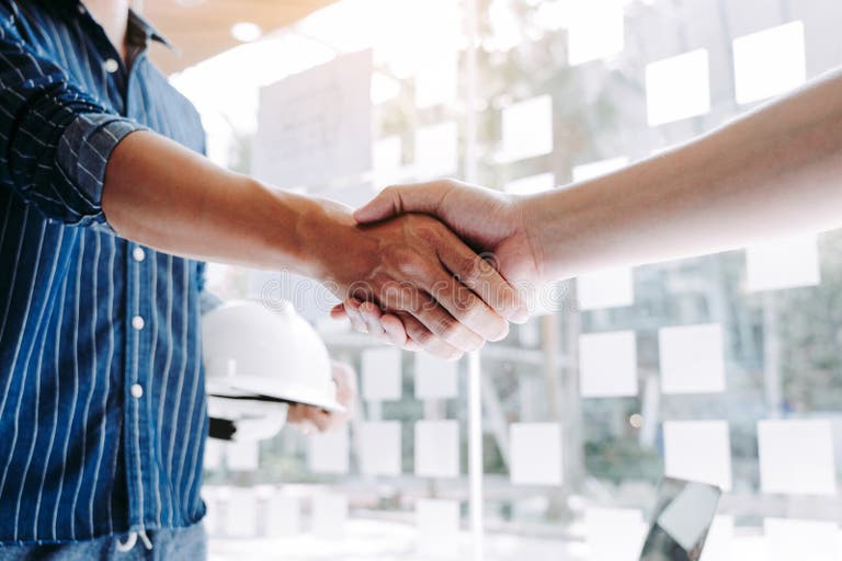 Two Engineering Man with Construction Worker Greeting a Foreman at ...