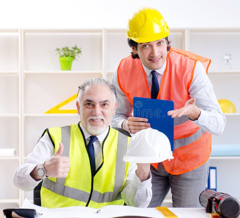 Two Engineers Colleagues Working Under Project Stock Photo - Image of ...