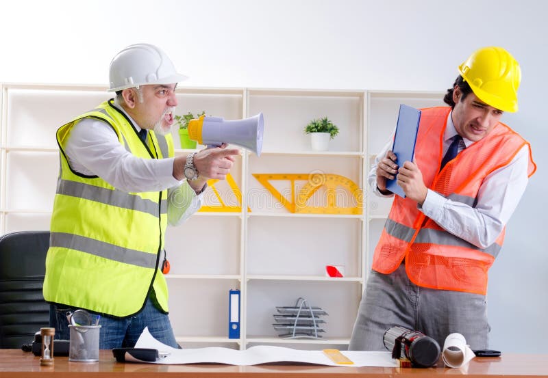 Two Engineers Colleagues Working Under Project Stock Photo - Image of ...