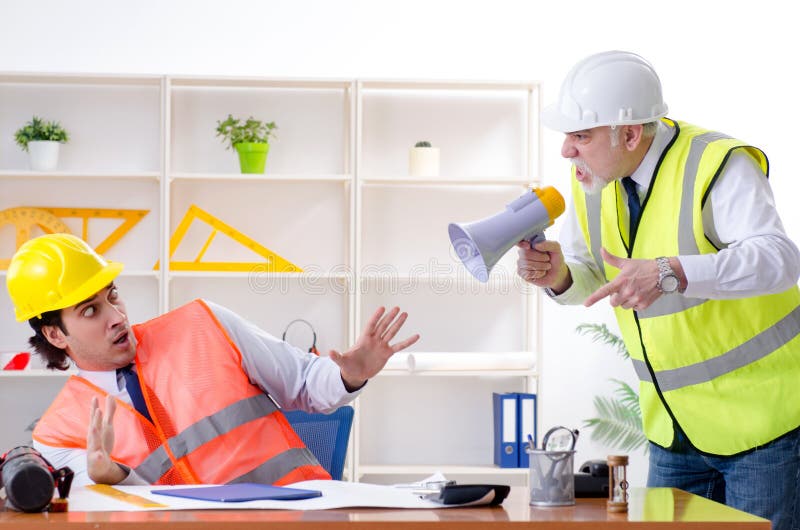 Two Engineers Colleagues Working Under Project Stock Photo - Image of ...