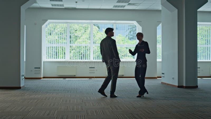 Two Engineers Discussing Building Together. Business Partners Shaking ...