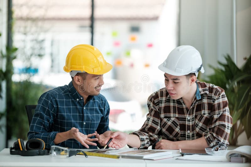 Two Engineers Discussion and Planning about Project. Brainstorming of ...
