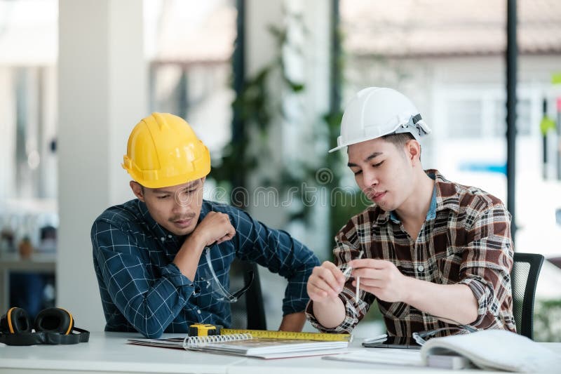 Two Engineers Discussion and Planning about Project. Brainstorming of ...