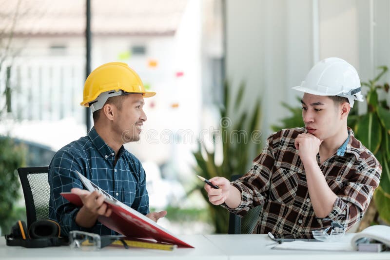 Two Engineers Discussion and Planning about Project. Brainstorming of ...