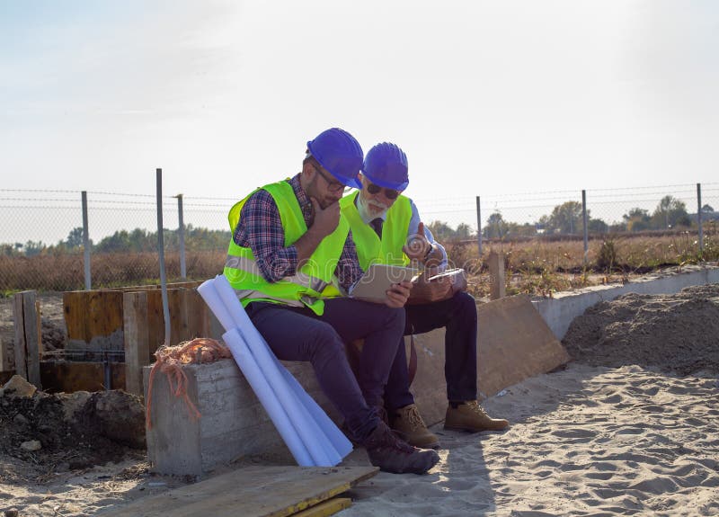 Engineers Talking at Building Site Stock Photo - Image of project ...