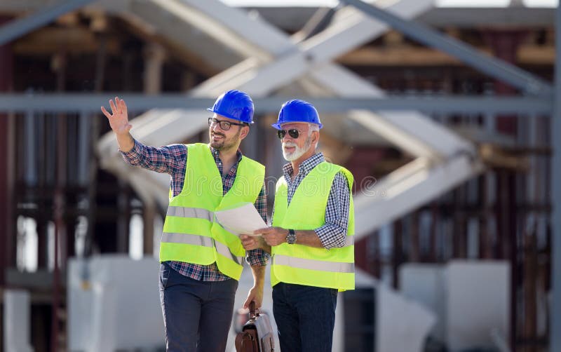 Engineers Talking at Building Site Stock Photo - Image of industry ...