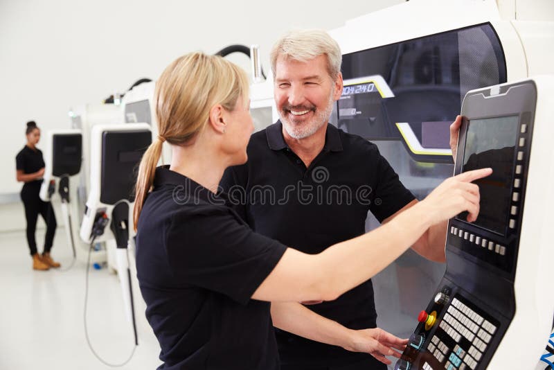 Team Engineers Operating Cnc Stock Photos - Free & Royalty-Free Stock ...
