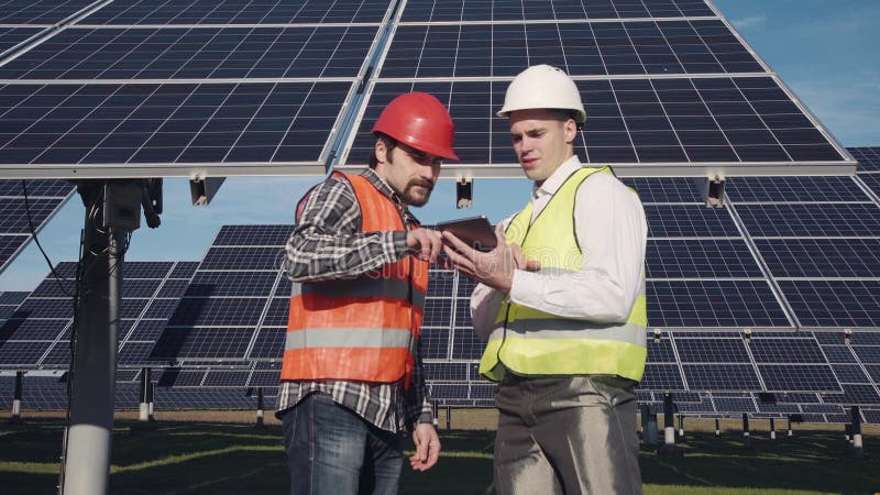 Two engineers with tablet. stock photo. Image of people - 92471338