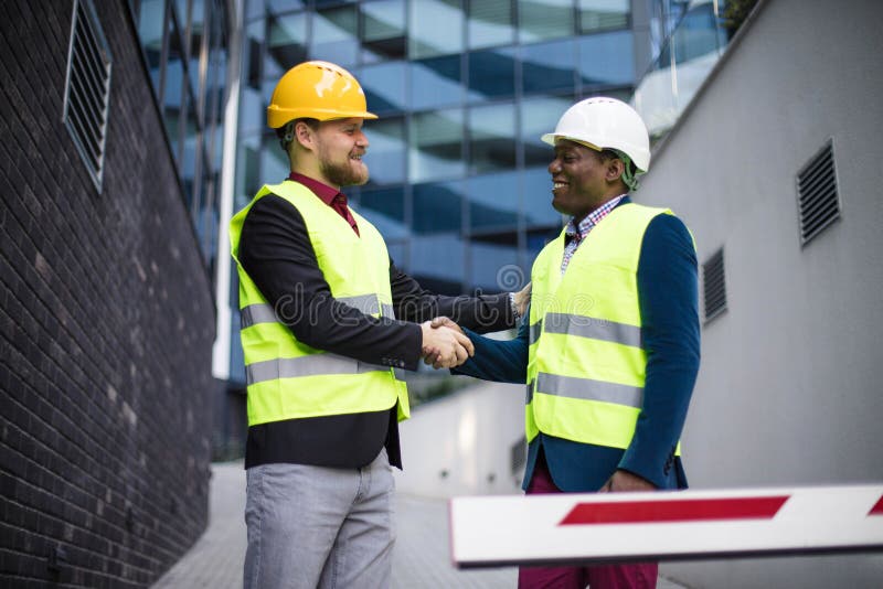 Engineers Talking at Office Stock Image - Image of blueprint ...