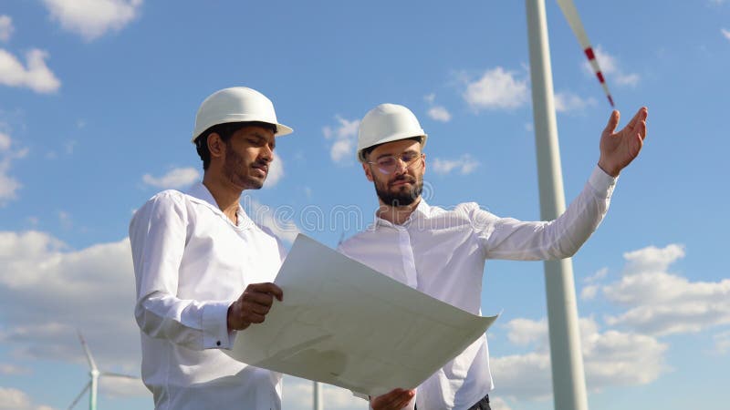 Two Multiracial Engineers or Technician Discuss about Project or Work ...